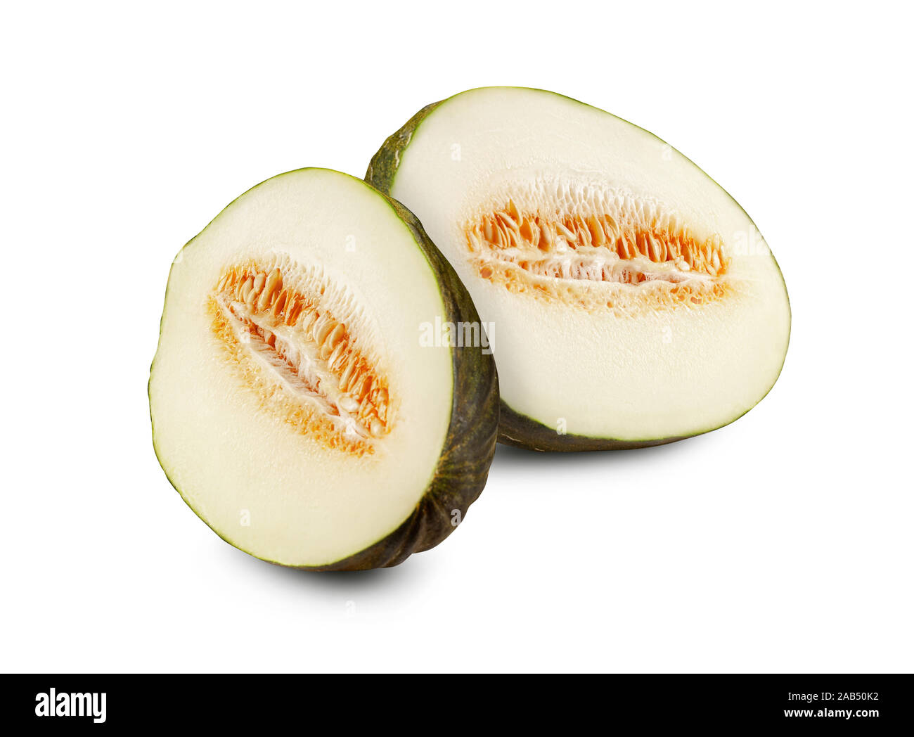 Two halves of green tendral melon in cross-section, isolated on white ...