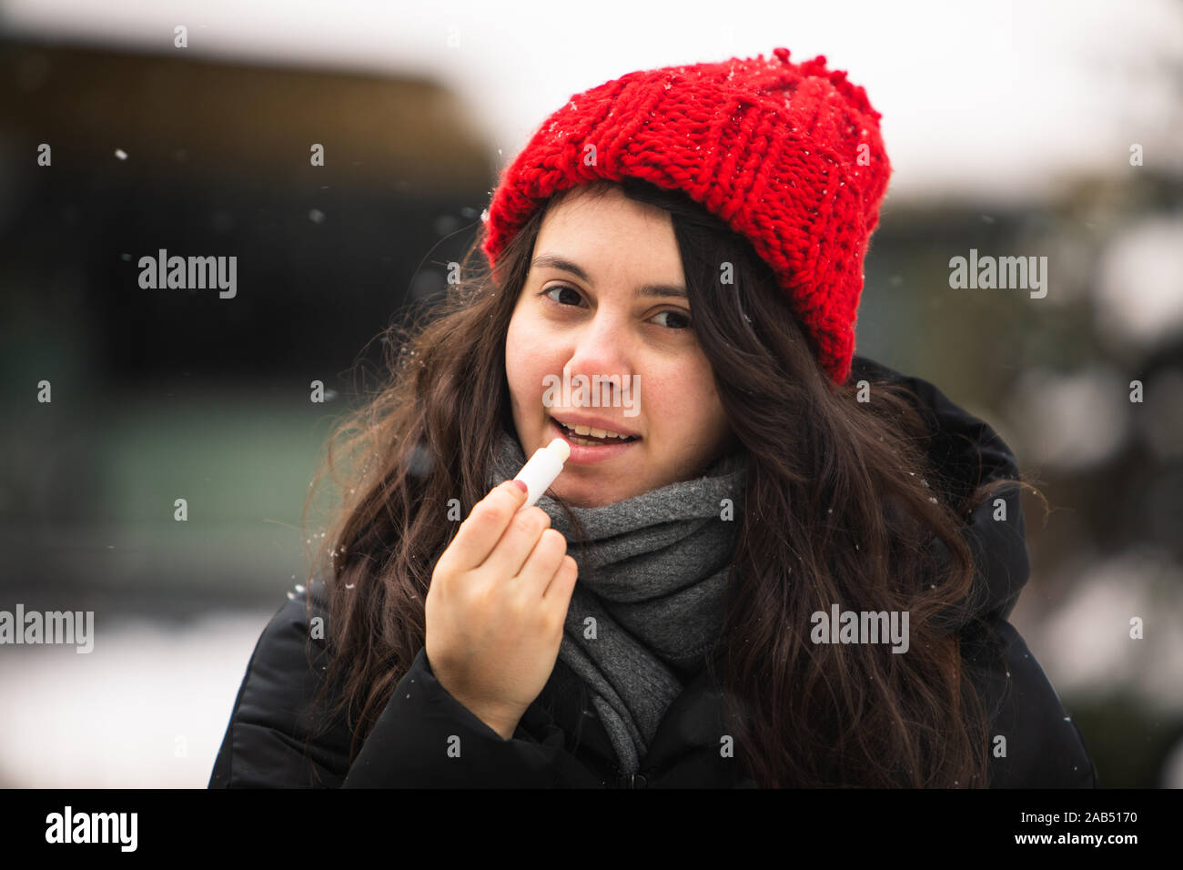 woman using cream at cold winter weather. skin protection Stock Photo ...
