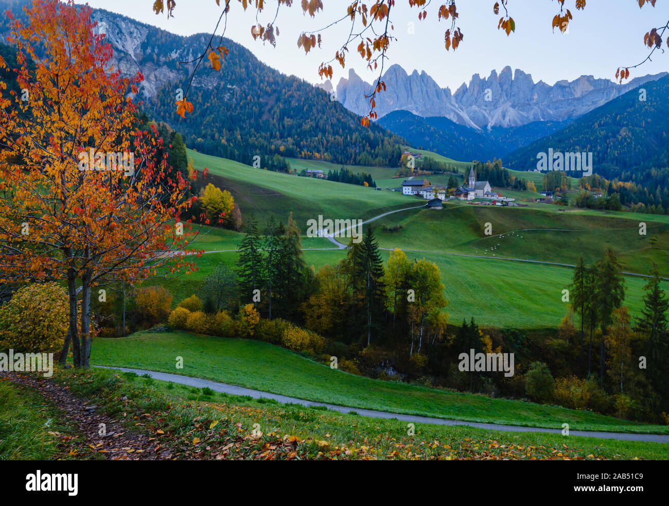Autumn daybreak Santa Magdalena famous Italy Dolomites village view in ...