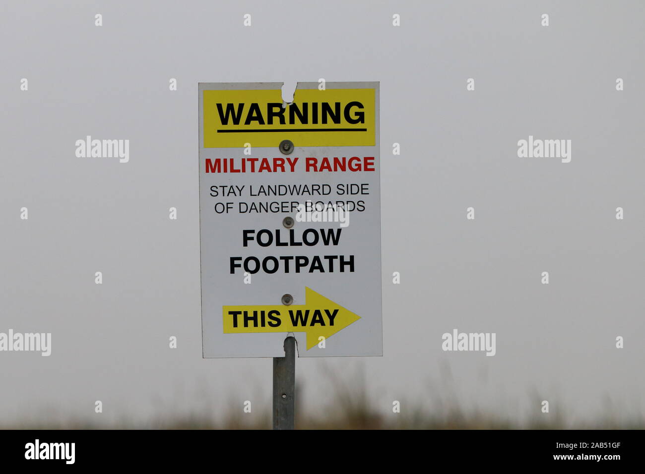 Warning sign as you approach Donna Nook bombing range Stock Photo - Alamy