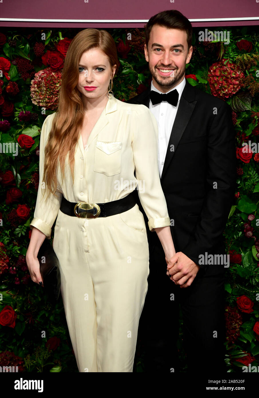Fly Davis (left) and guest attending the 65th Evening Standard Theatre ...