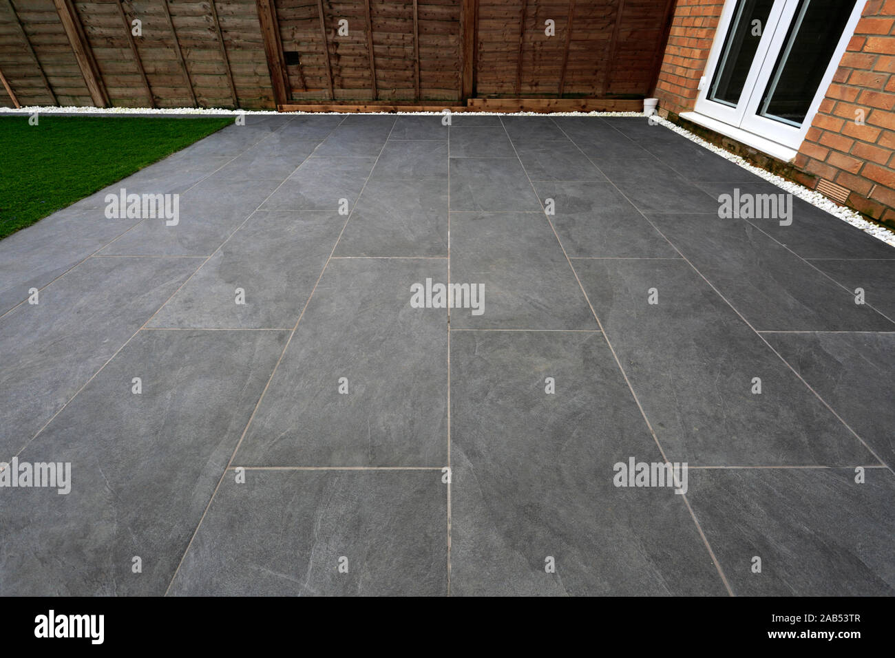Patio paving slabs in a residential garden environment Stock Photo - Alamy