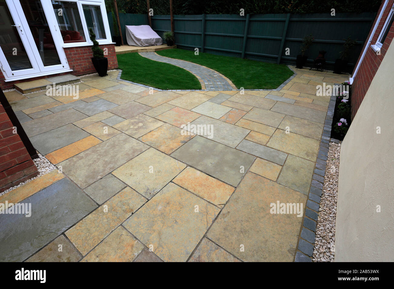Patio paving slabs in a residential garden environment Stock Photo - Alamy