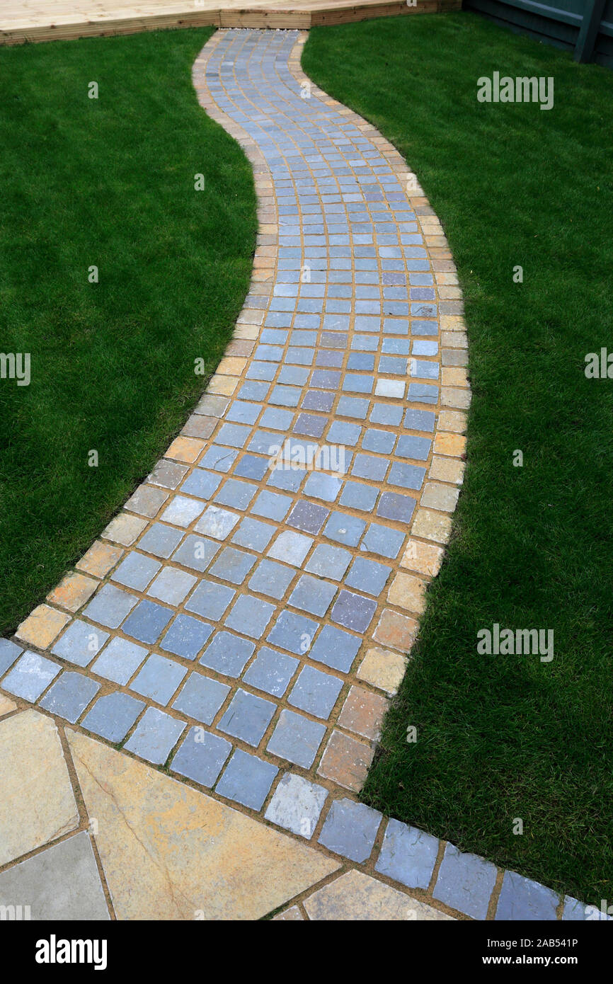 Patio paving slabs in a residential garden environment Stock Photo - Alamy