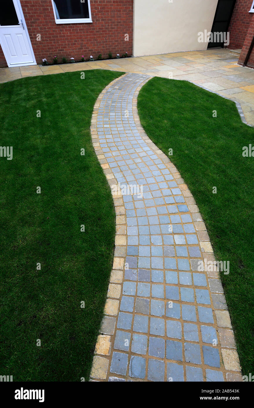 Patio paving slabs in a residential garden environment Stock Photo - Alamy