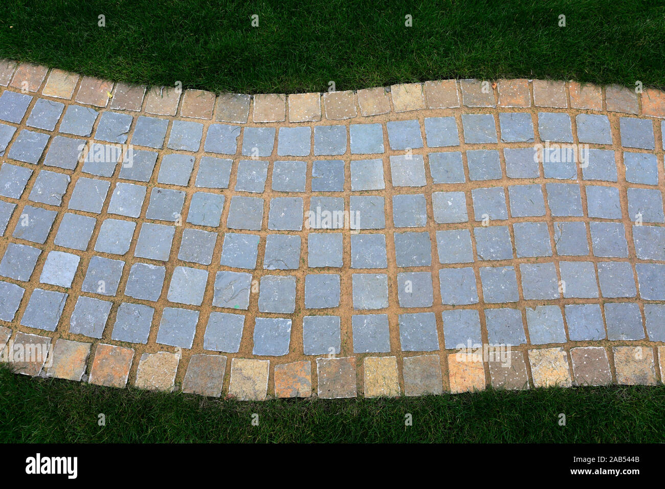 Patio paving slabs in a residential garden environment Stock Photo - Alamy