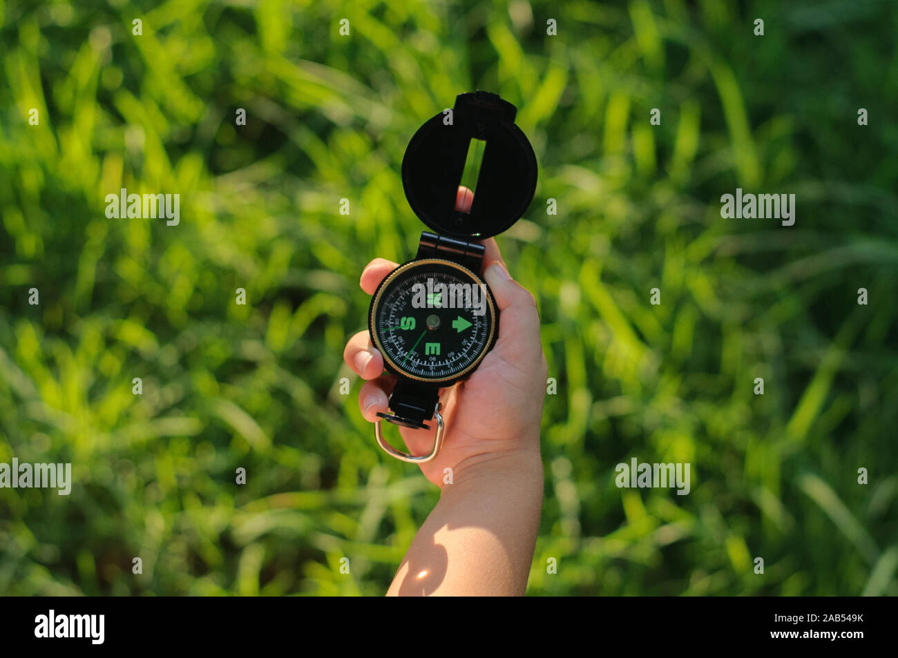 Child compass map hi-res stock photography and images - Alamy