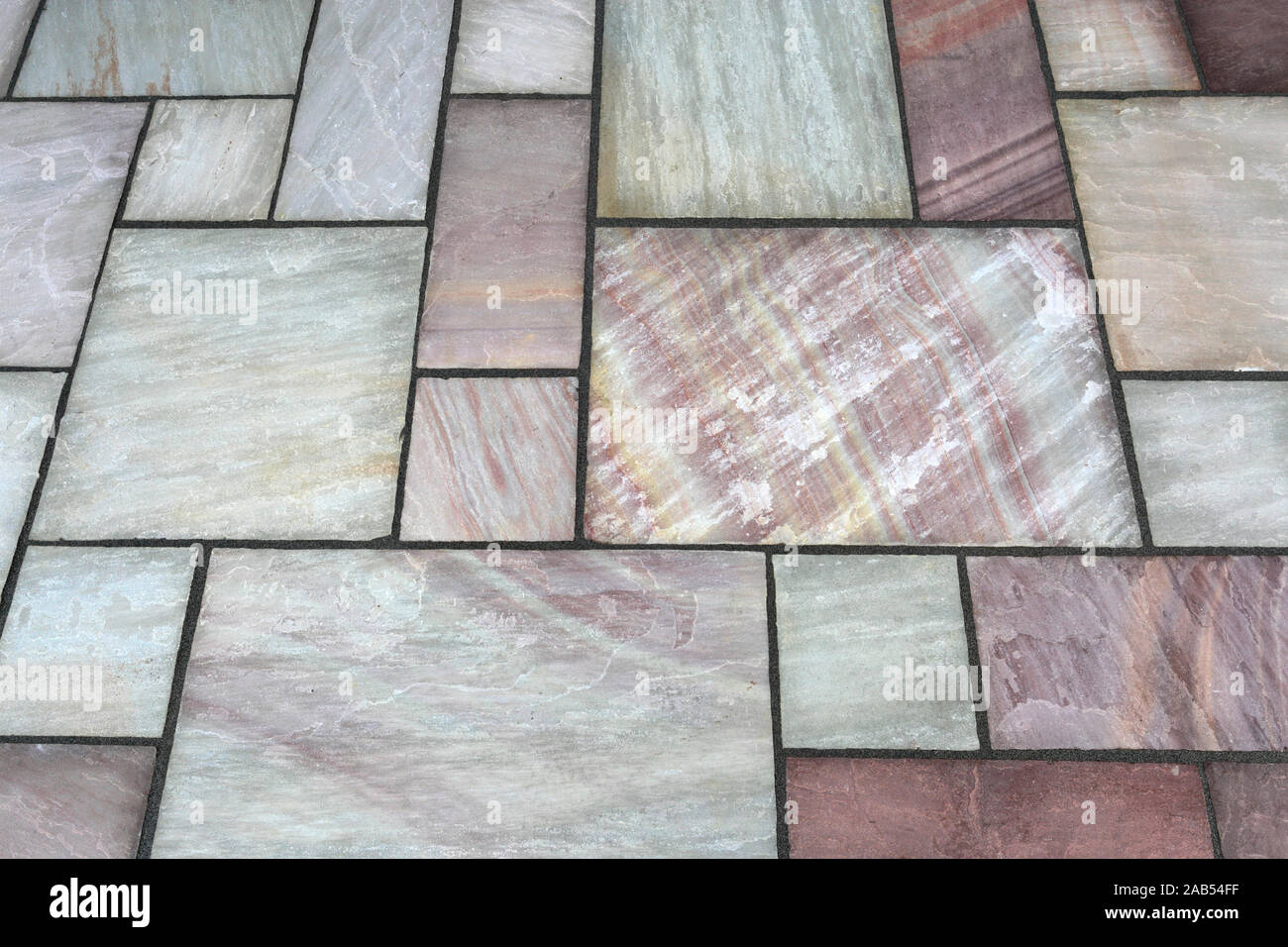 Patio paving slabs in a residential garden environment Stock Photo - Alamy