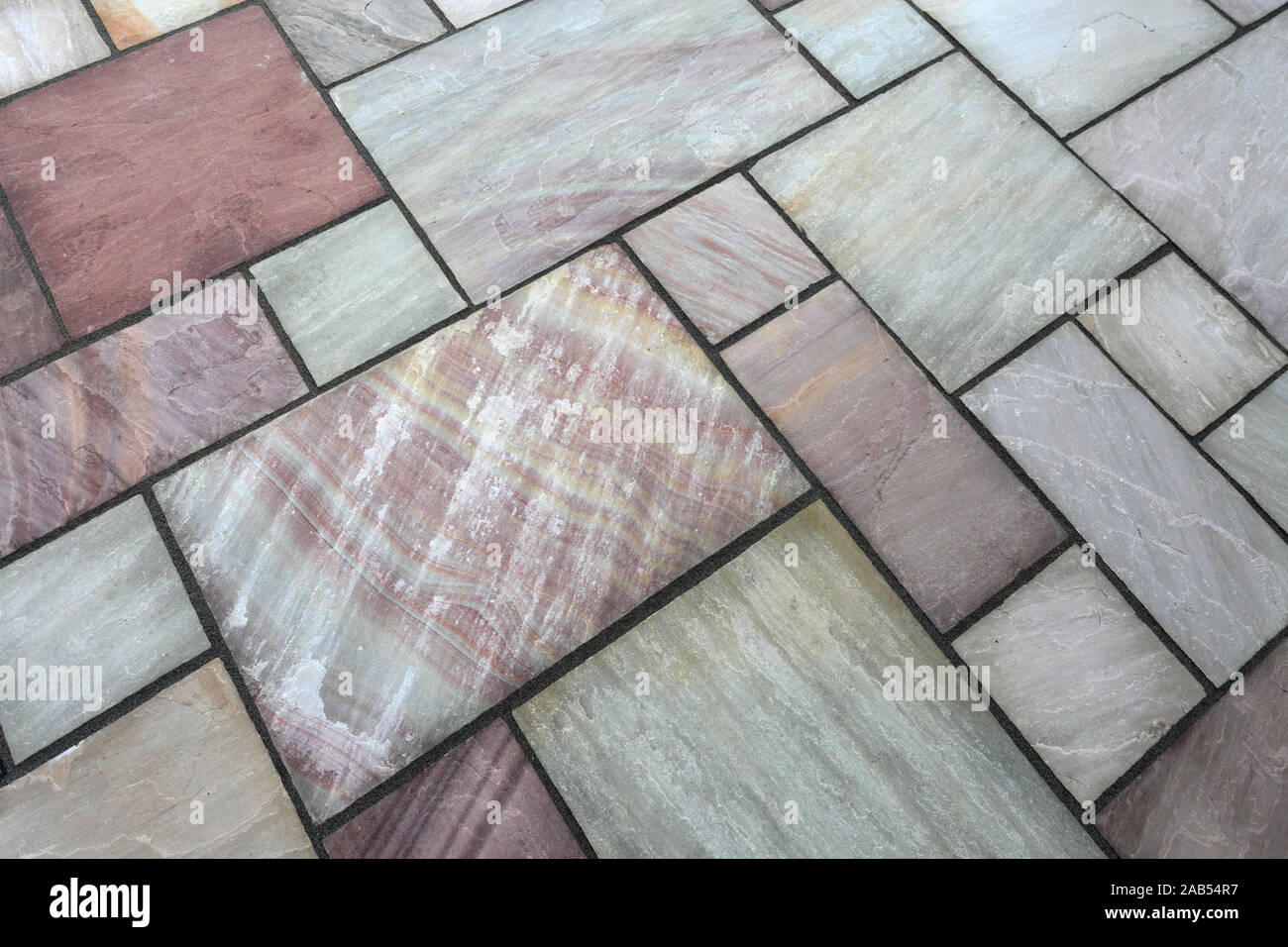 Patio paving slabs in a residential garden environment Stock Photo - Alamy