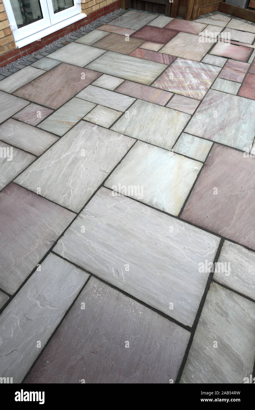 Patio paving slabs in a residential garden environment Stock Photo - Alamy
