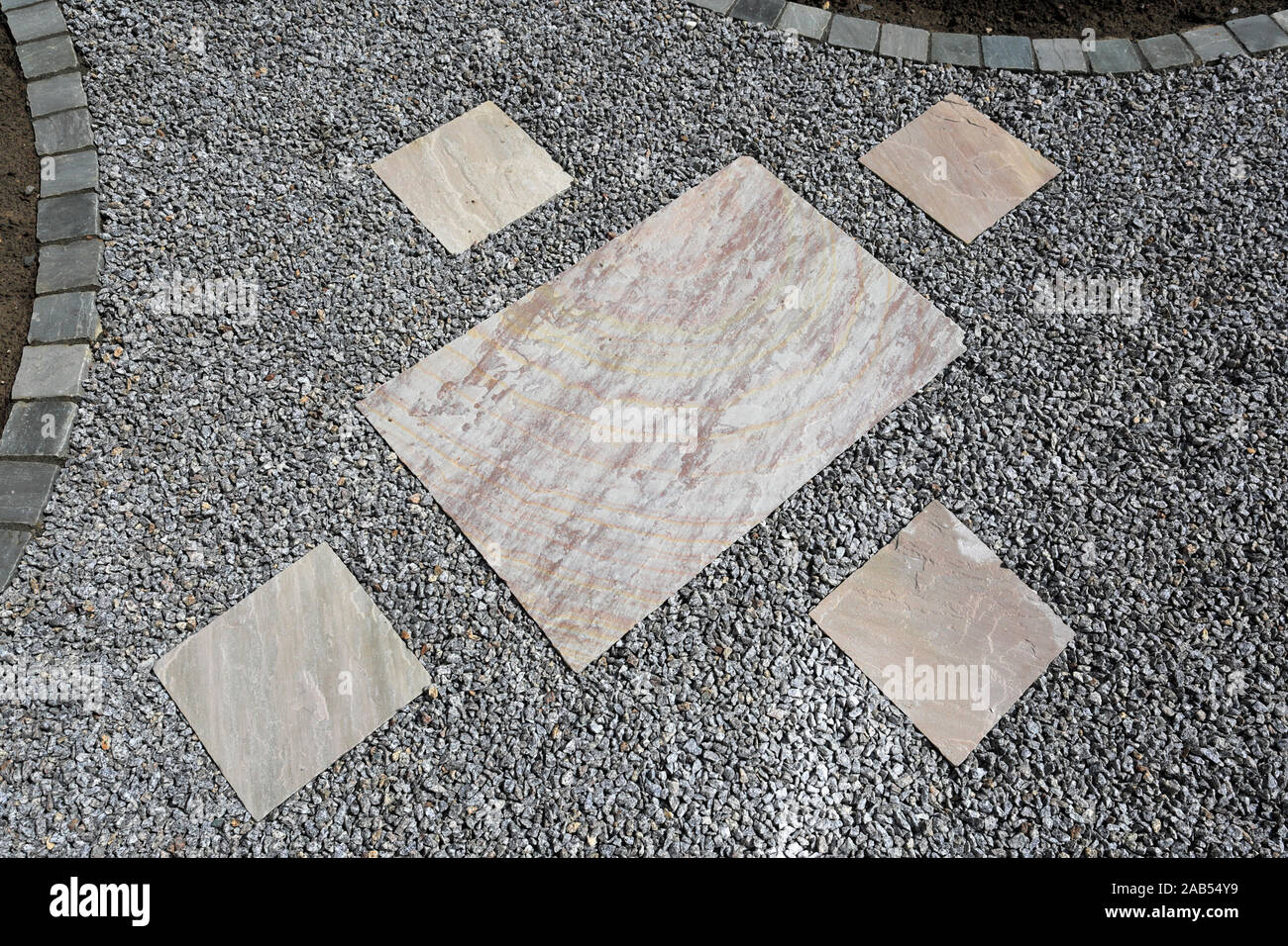 Patio paving slabs in a residential garden environment Stock Photo - Alamy