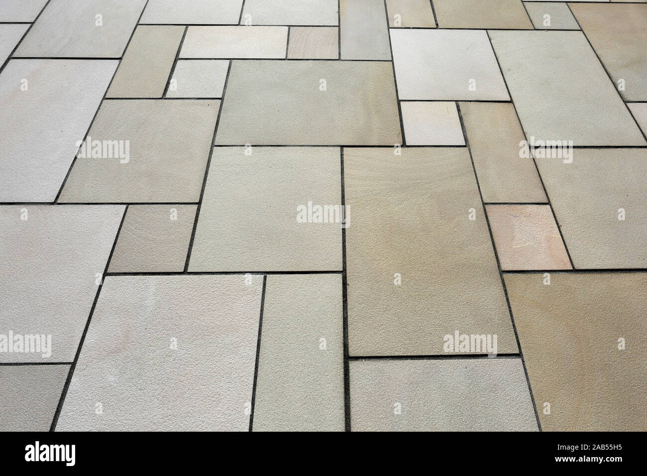 Patio paving slabs in a residential garden environment Stock Photo - Alamy