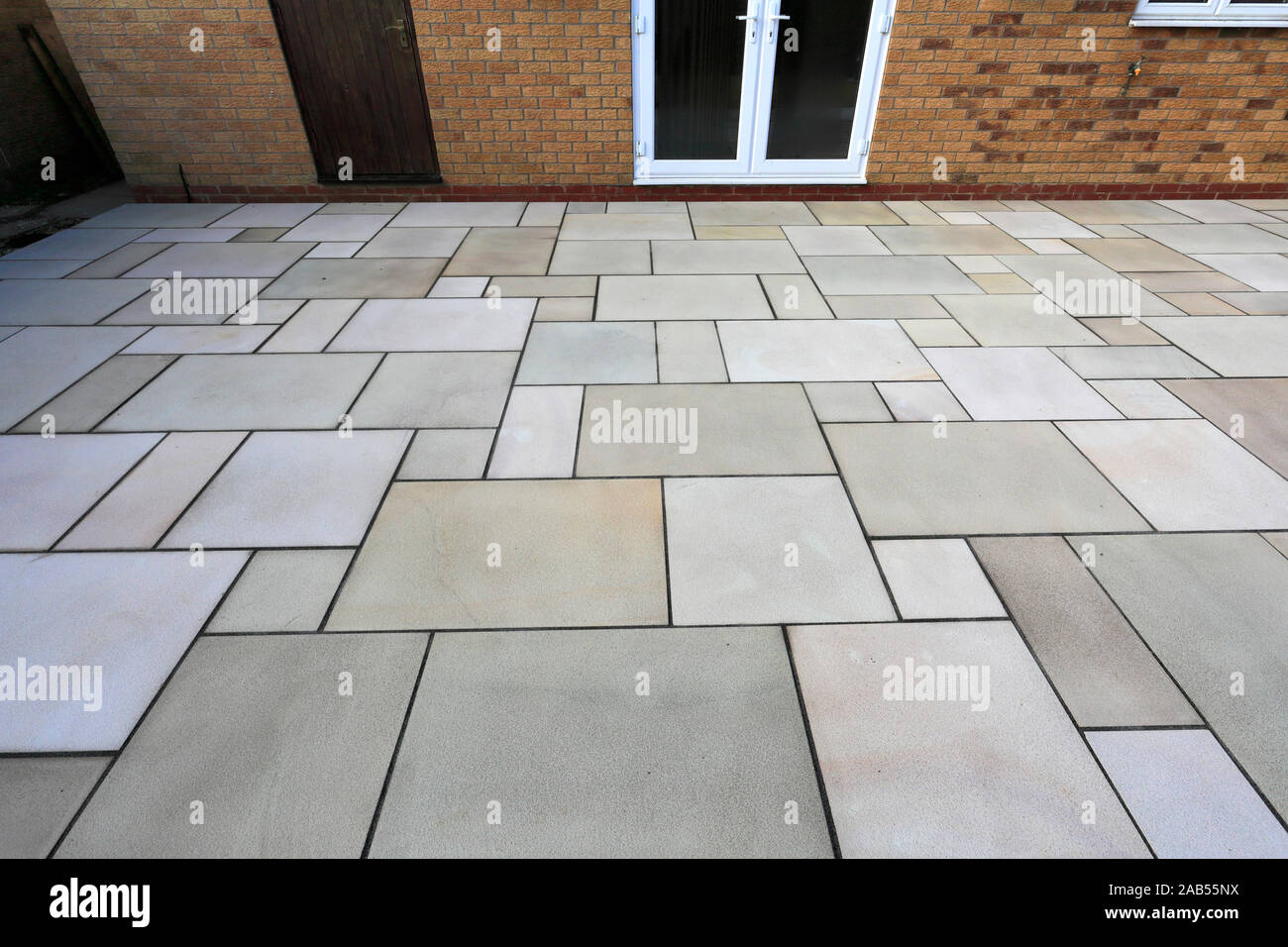 Patio paving slabs in a residential garden environment Stock Photo - Alamy