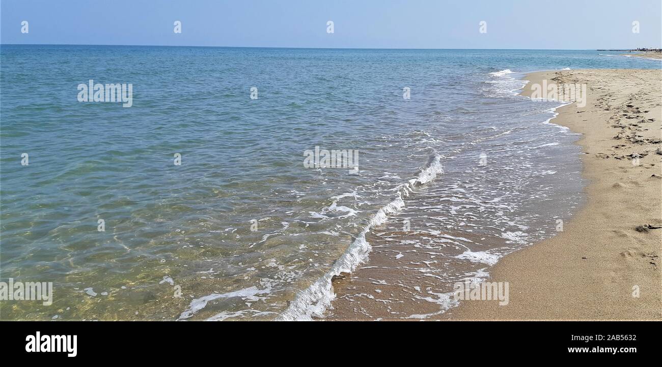 Beautiful background with beach and crystal clear sea Stock Photo - Alamy