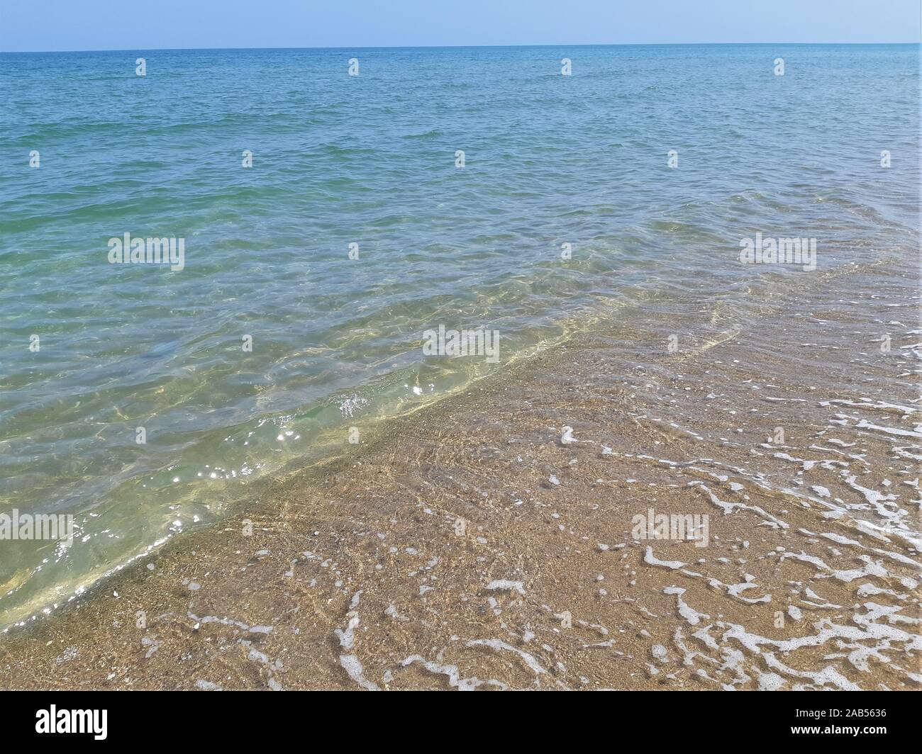 Beautiful background with beach and crystal clear sea Stock Photo - Alamy
