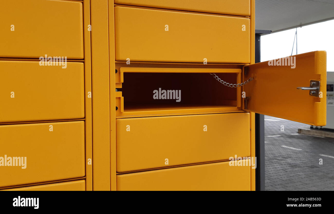 Self service storage cabinet for picking up a package in a city area ...