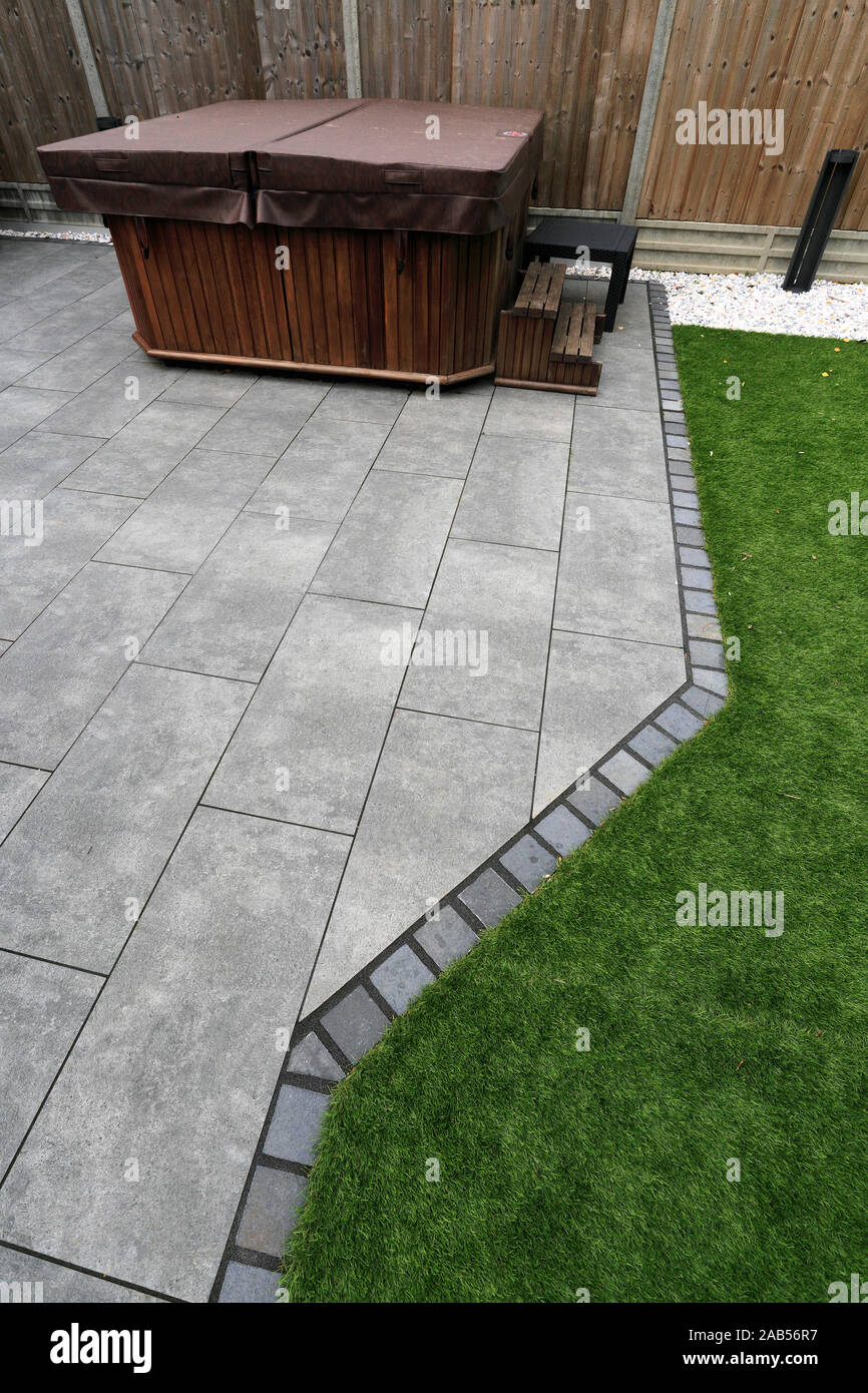 Patio paving slabs in a residential garden environment Stock Photo - Alamy