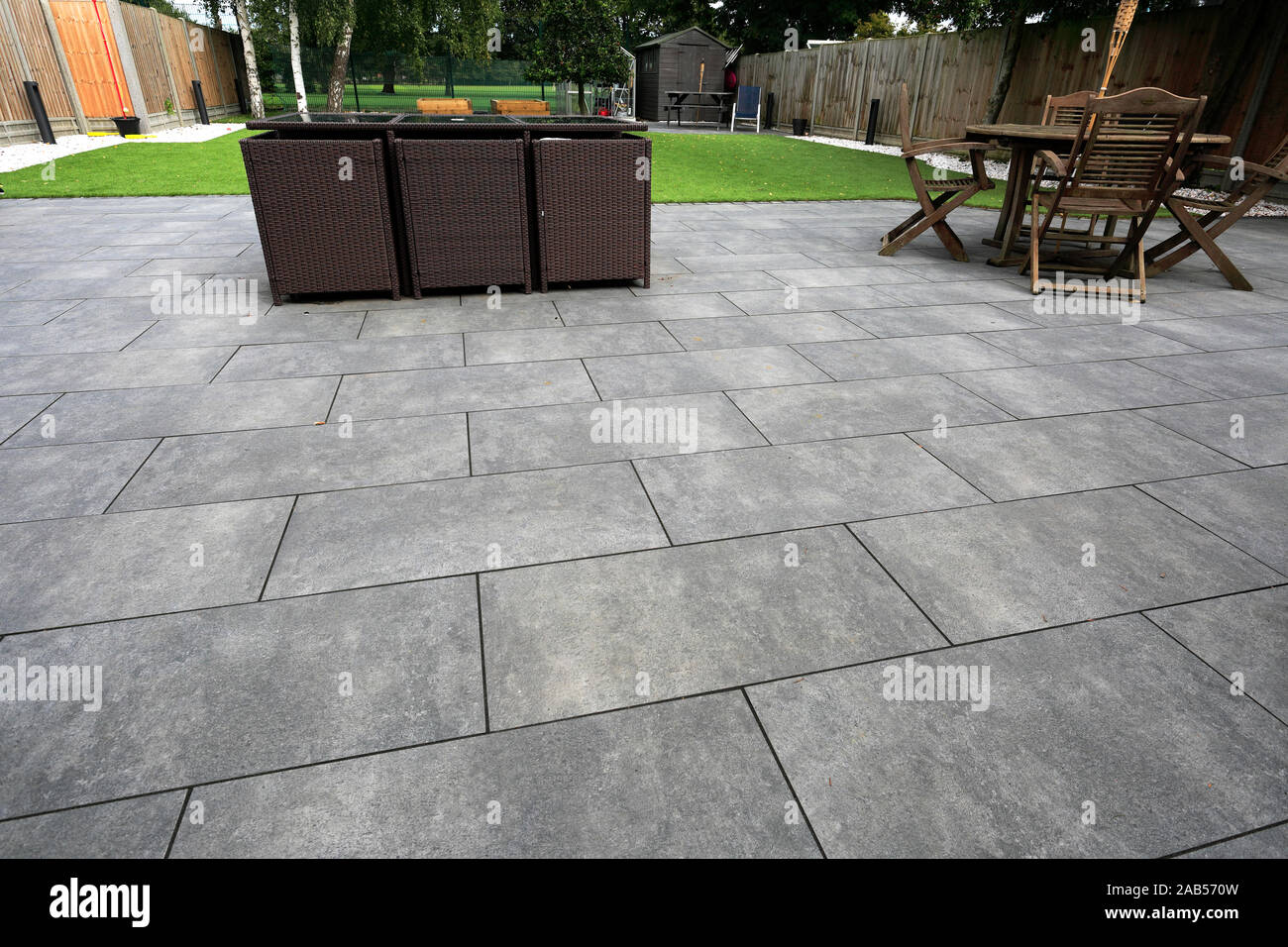 Patio paving slabs in a residential garden environment Stock Photo - Alamy