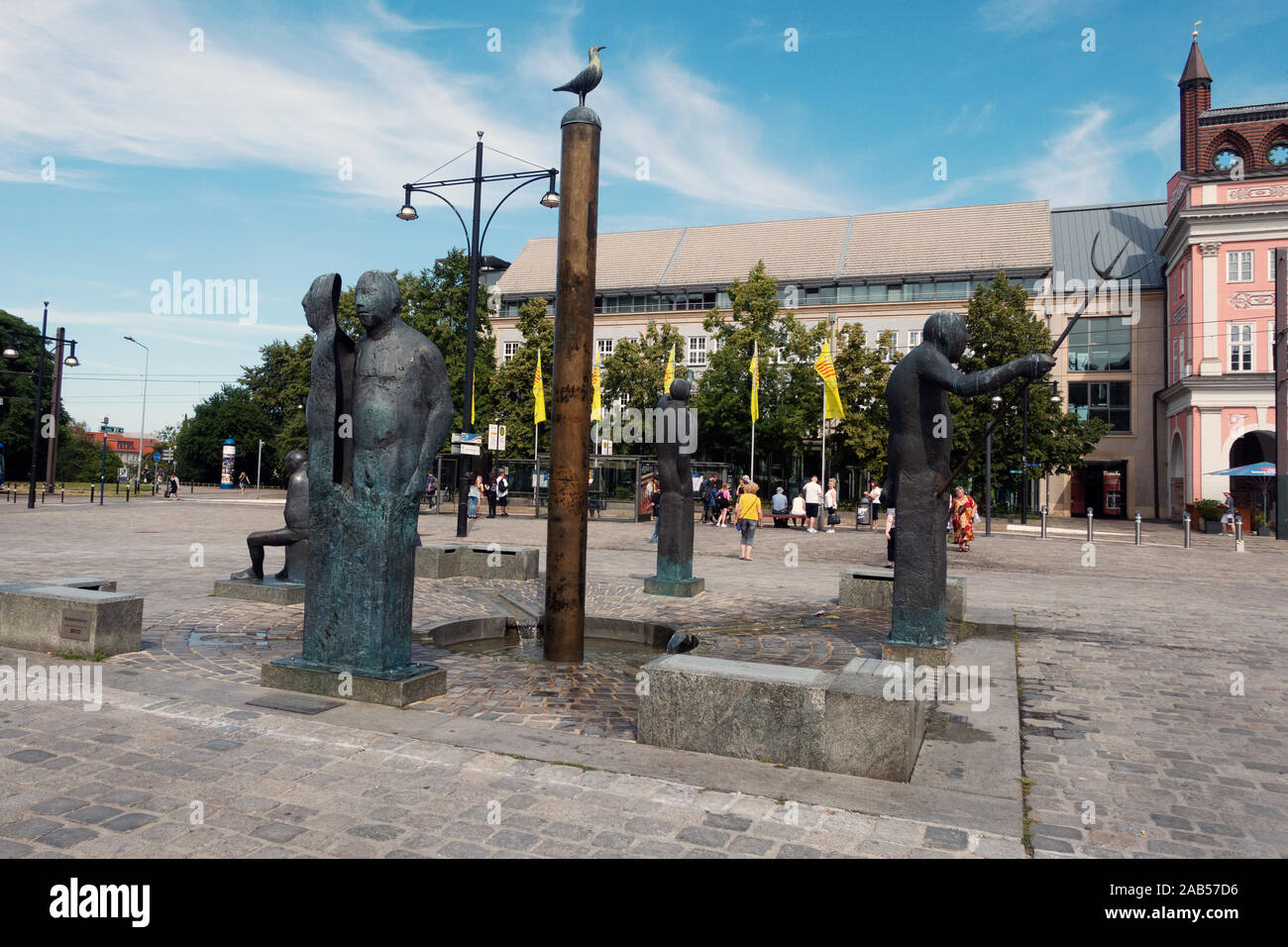 Sculptures in Neuer Markt Square, Rostock Stock Photo - Alamy