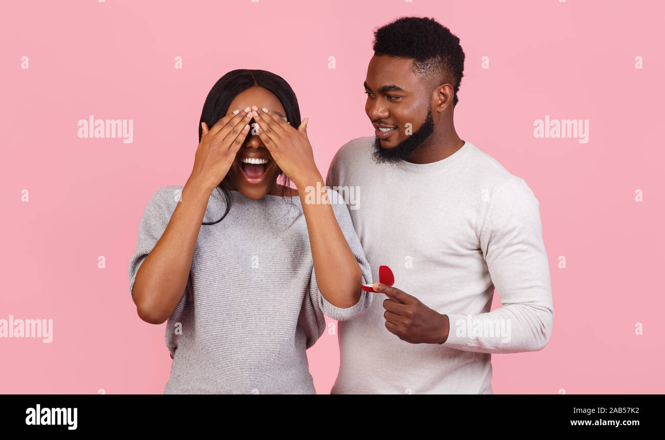 Black guy making proposal with beautiful ring Stock Photo - Alamy