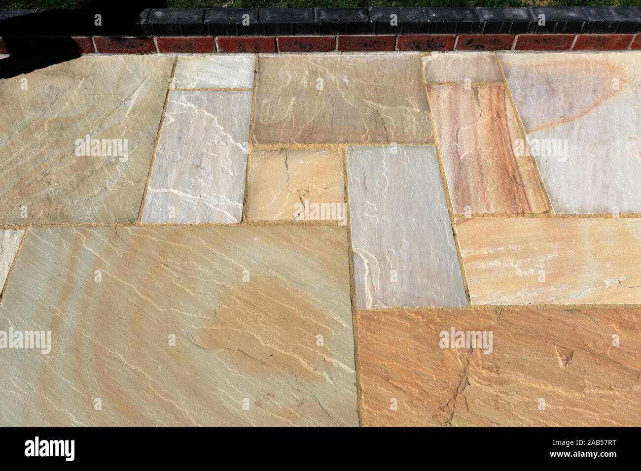 Patio paving slabs in a residential garden environment Stock Photo - Alamy