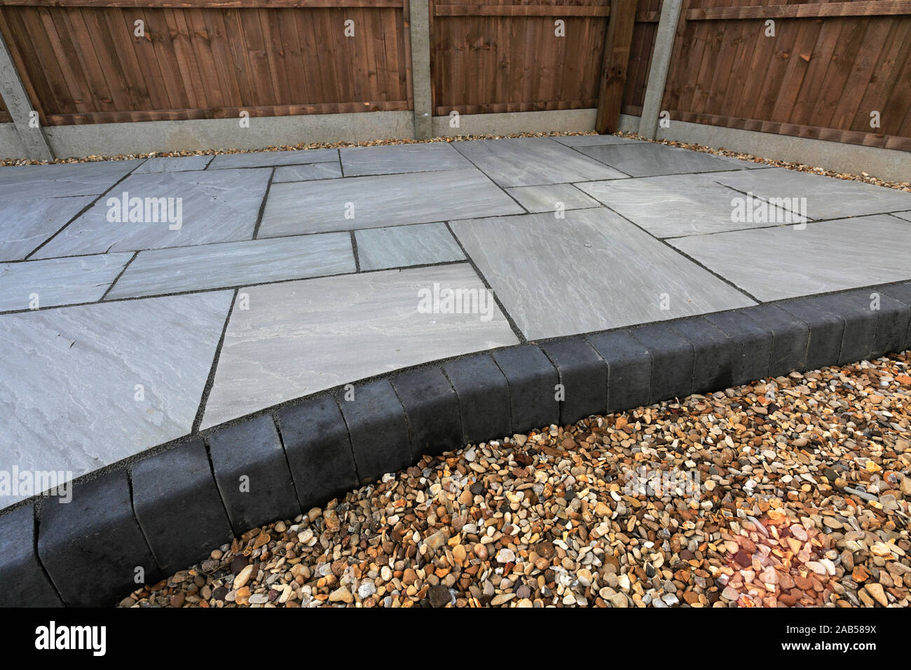 Patio paving slabs in a residential garden environment Stock Photo - Alamy
