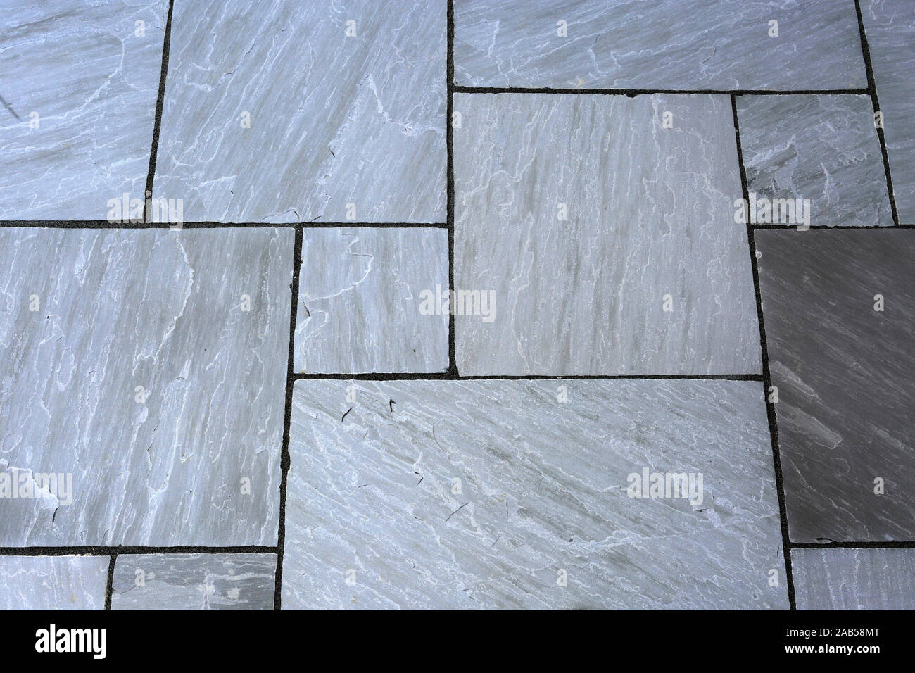 Patio paving slabs in a residential garden environment Stock Photo - Alamy