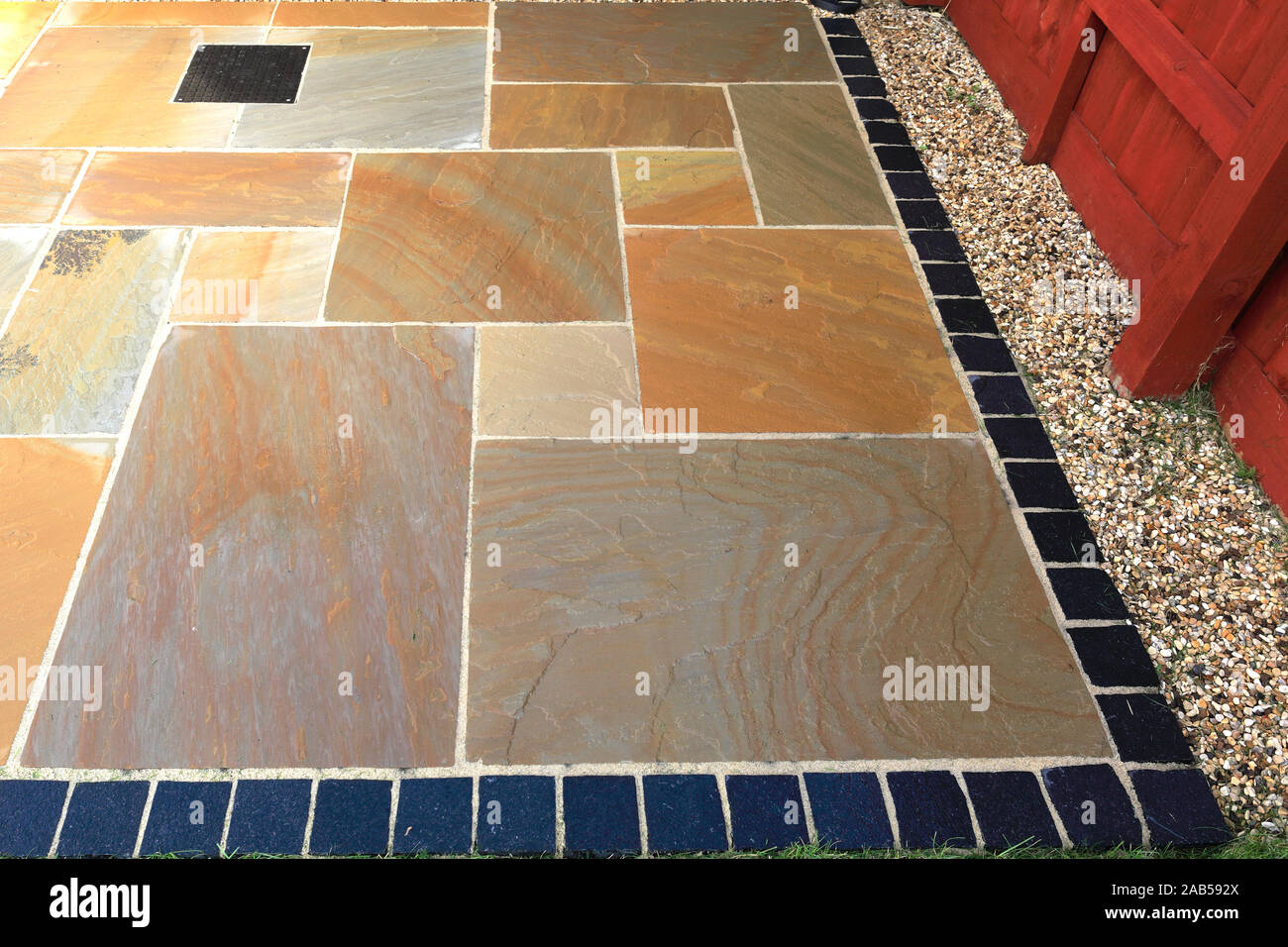 Patio paving slabs in a residential garden environment Stock Photo - Alamy
