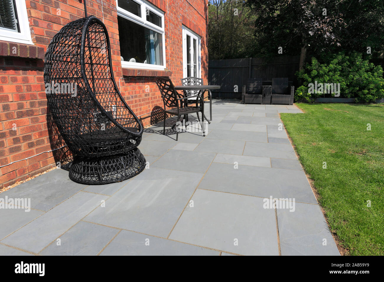 Patio paving slabs in a residential garden environment Stock Photo - Alamy
