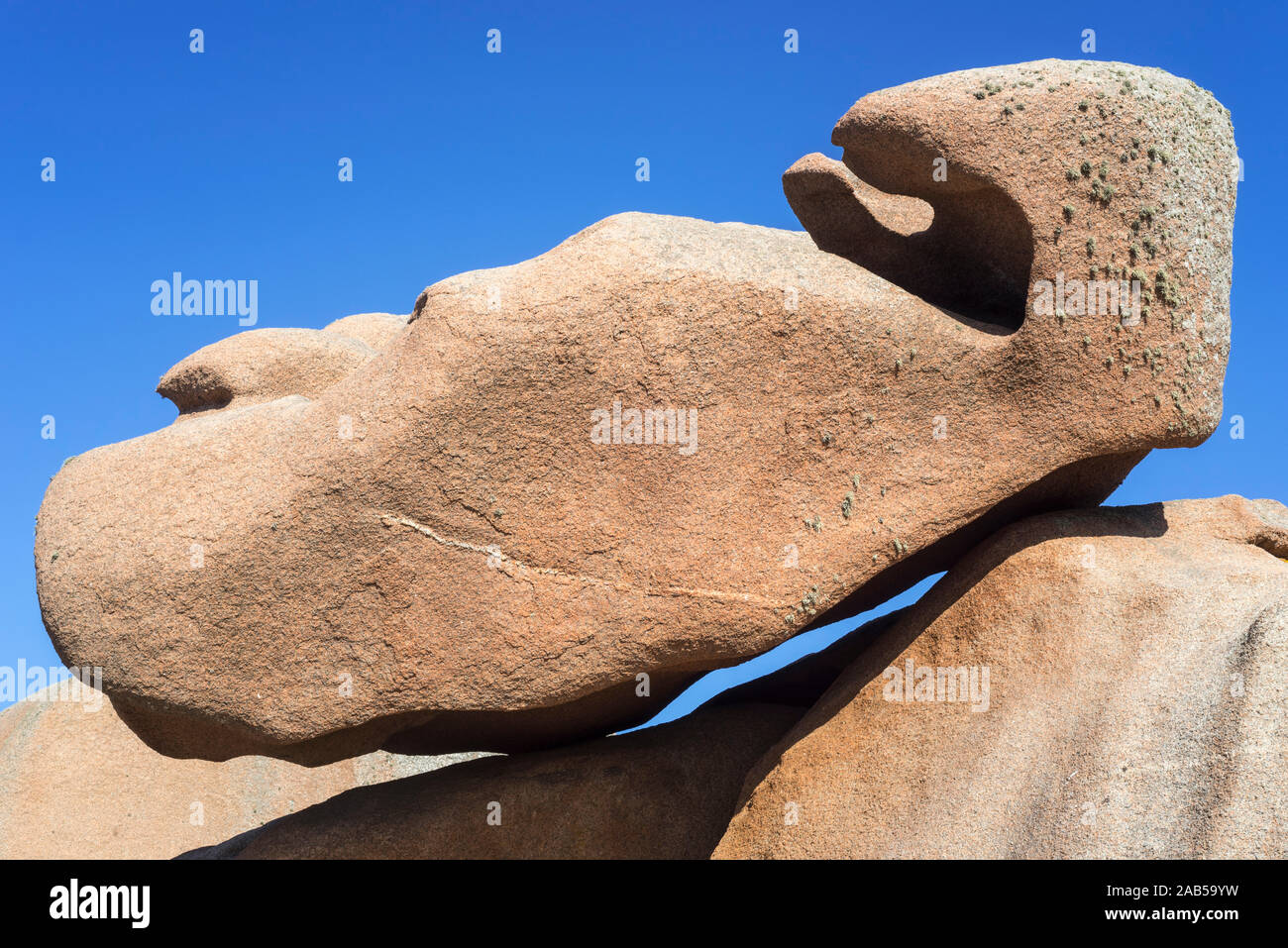 Strange rock formations and water / wind eroded boulders along the Côte ...