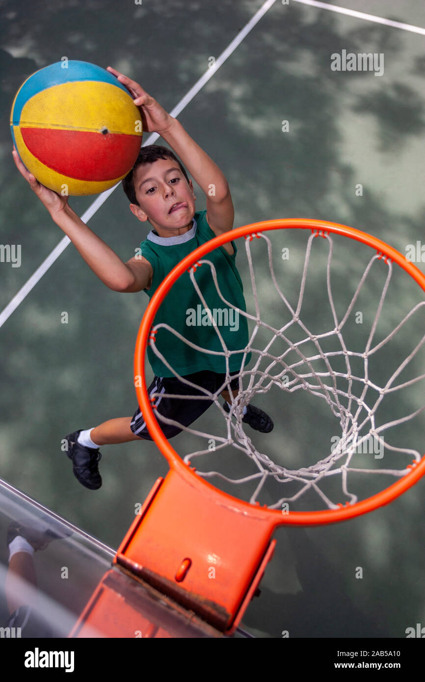Children playing basketball overhead hi-res stock photography and ...
