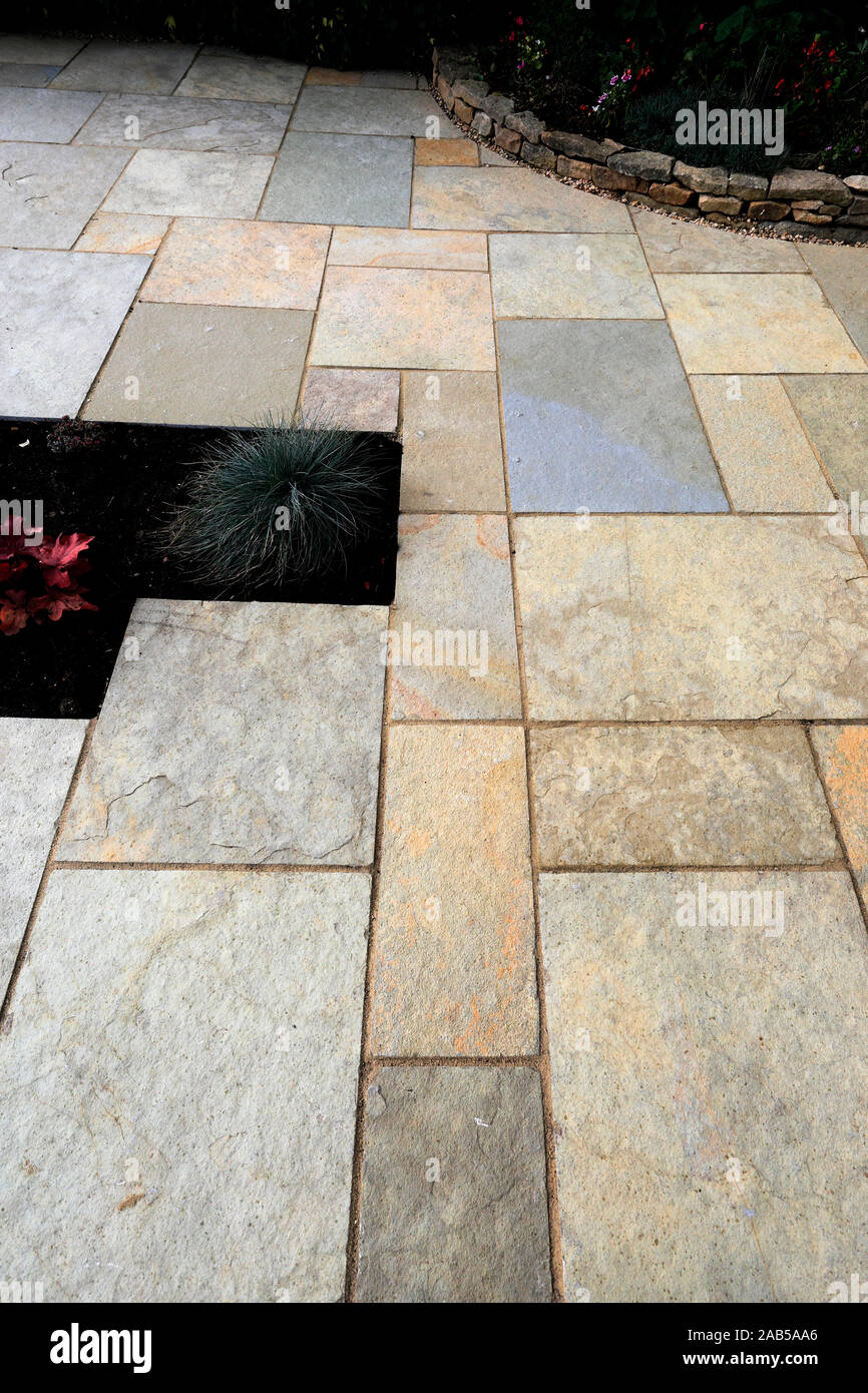 Patio paving slabs in a residential garden environment Stock Photo - Alamy