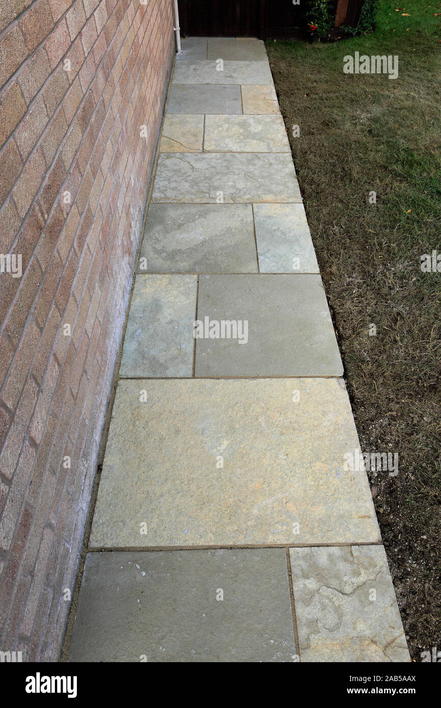 Patio paving slabs in a residential garden environment Stock Photo - Alamy