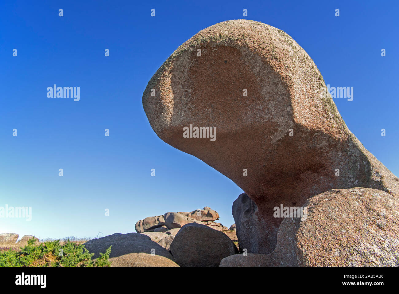 Strange rock formations and water / wind eroded boulders along the Côte ...