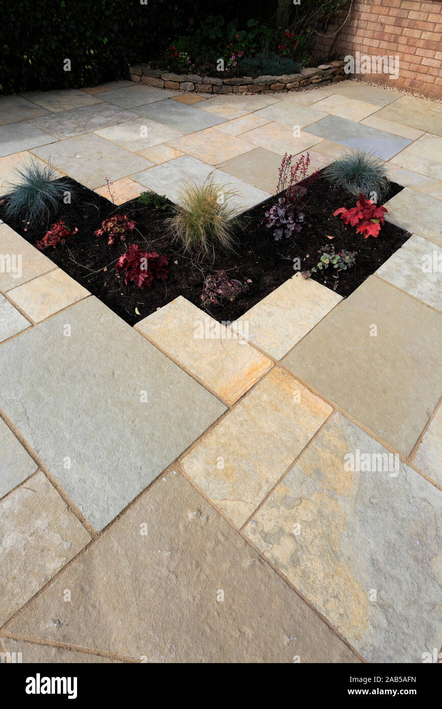 Patio paving slabs in a residential garden environment Stock Photo - Alamy