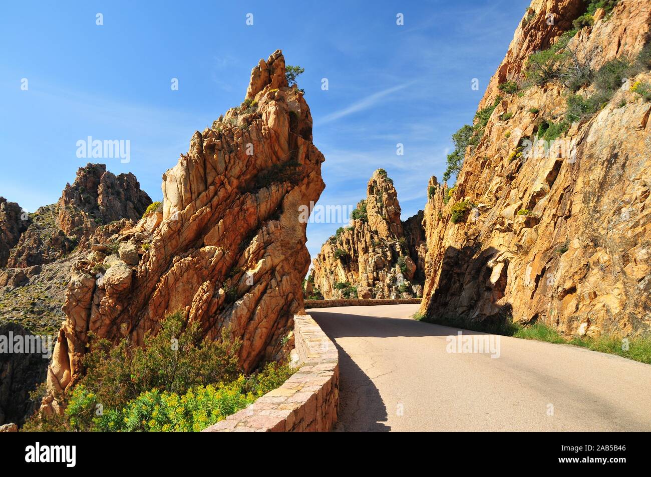 Granite rock formation on the coastal road through the Calanche de ...