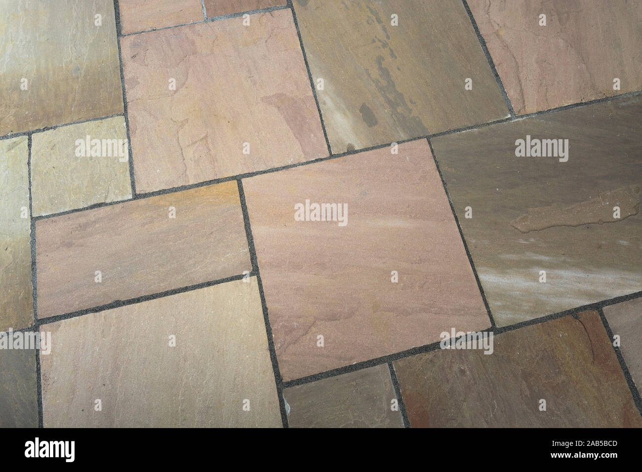 Patio paving slabs in a residential garden environment Stock Photo - Alamy