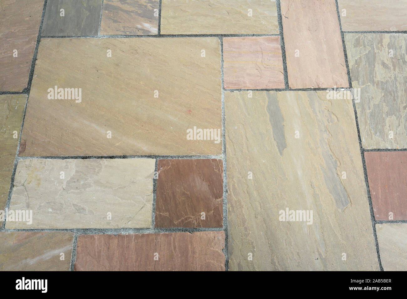 Patio paving slabs in a residential garden environment Stock Photo - Alamy