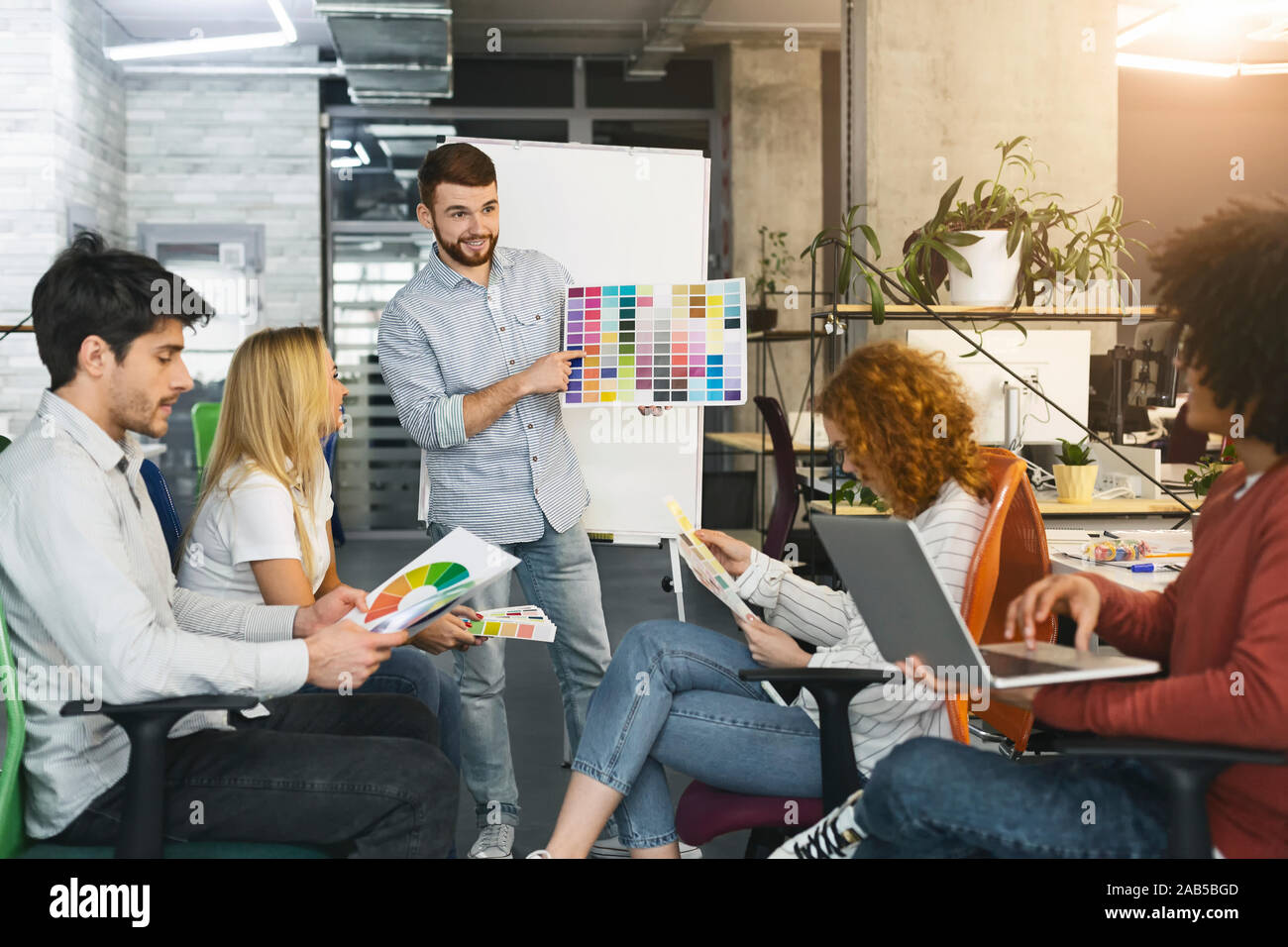 Professional creative team choosing color design for new project Stock ...