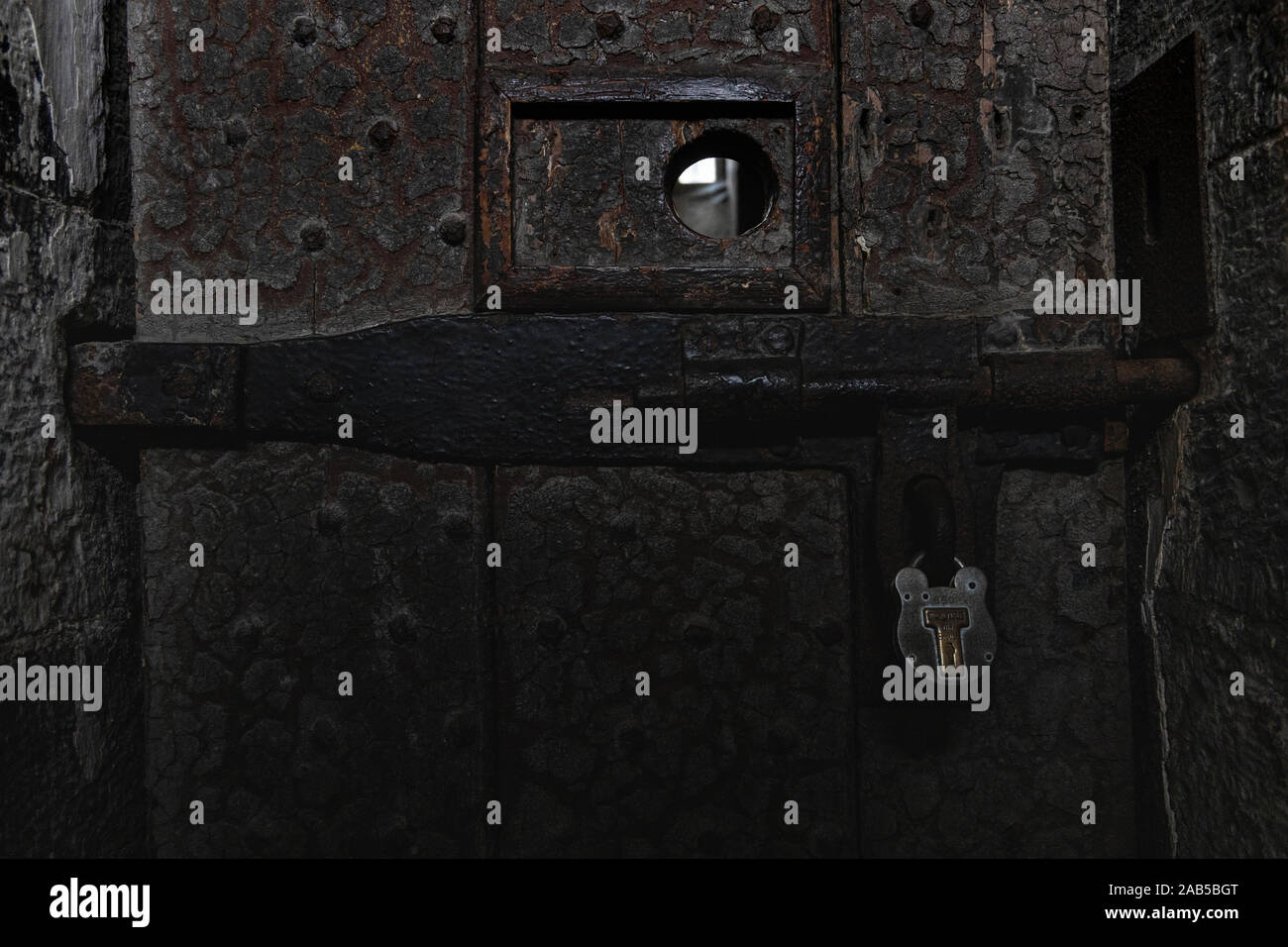 Jail cell doors locked shut in the old part of Kilmainham Gaol museum ...