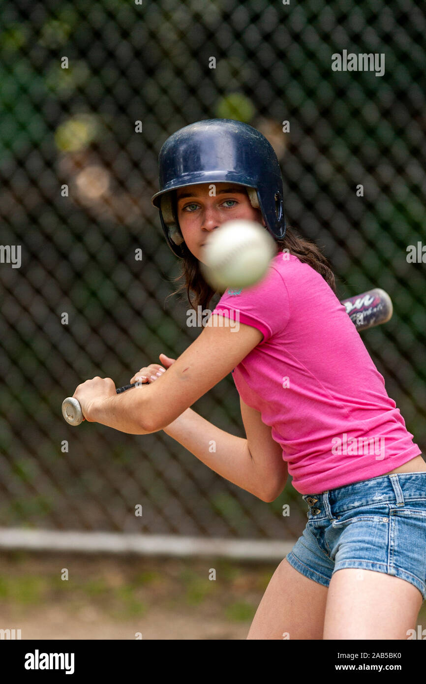 Girls playing softball at day camp Stock Photo - Alamy