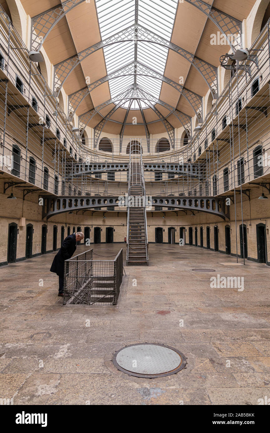 East wing in Kilmainham gaol museum with metal staircase and modern ...