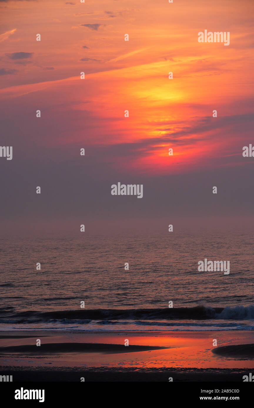 Sunset on the beach in Holland Stock Photo - Alamy