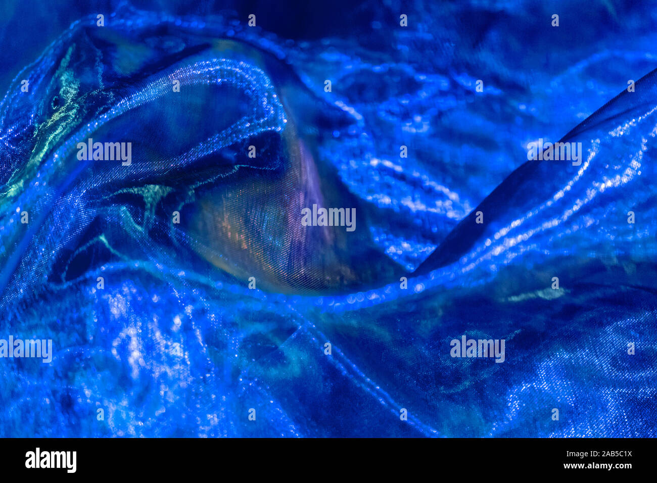 Blue-colored cloth as a background for a card Stock Photo - Alamy