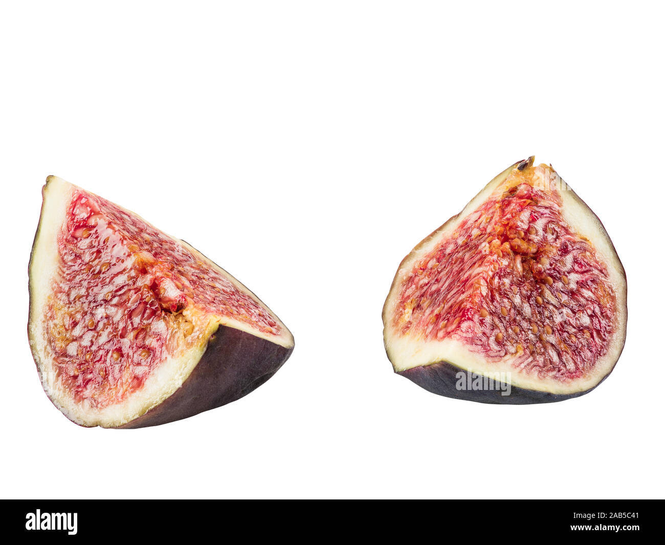 Two slices of purple fig isolated on white background with copy space ...