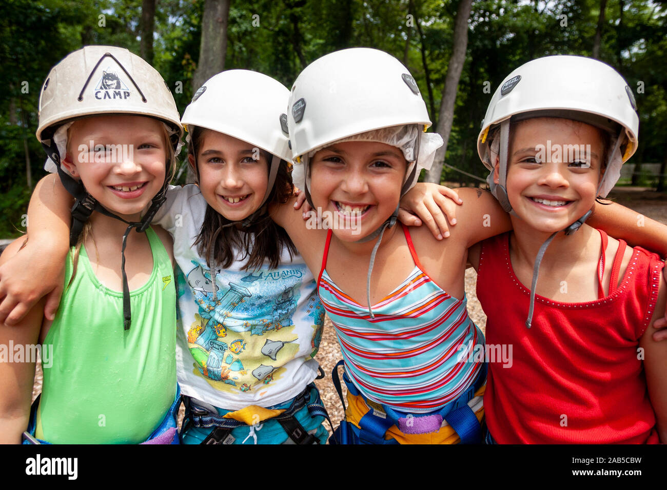 Girl on zip line hi-res stock photography and images - Alamy