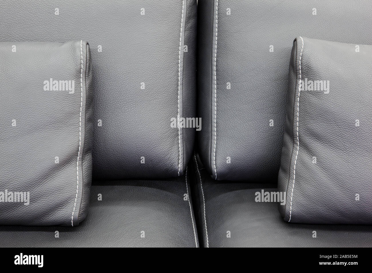 Back of a black leather sofa Stock Photo - Alamy