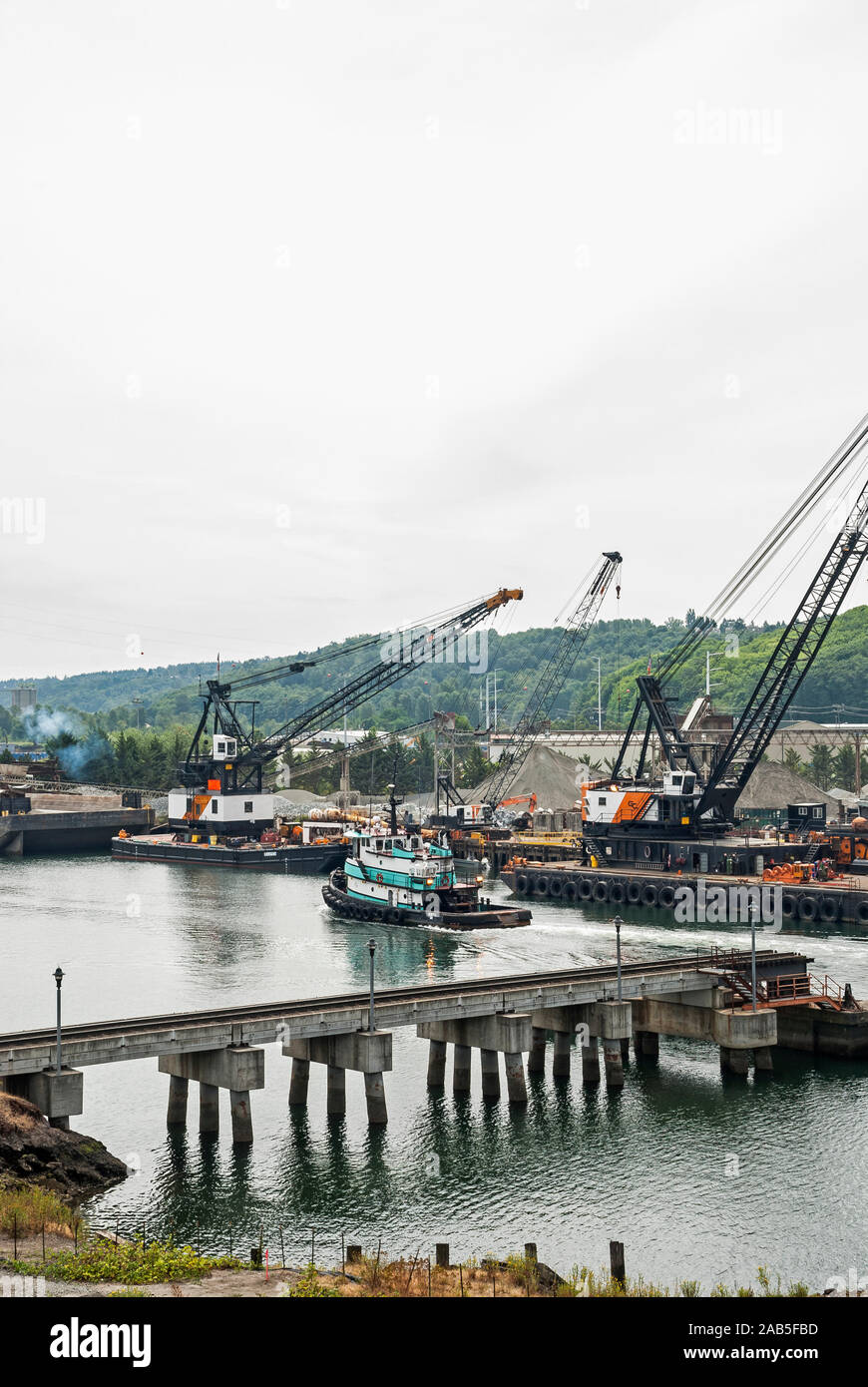 Cranes on barges near the West Seattle Bridge (Jeanette Williams ...