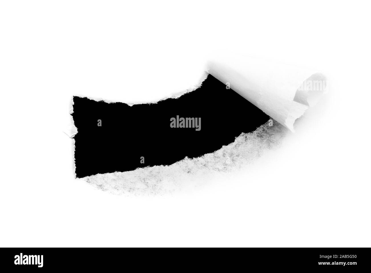 Hole in white paper with torn edges isolated on a white background with ...