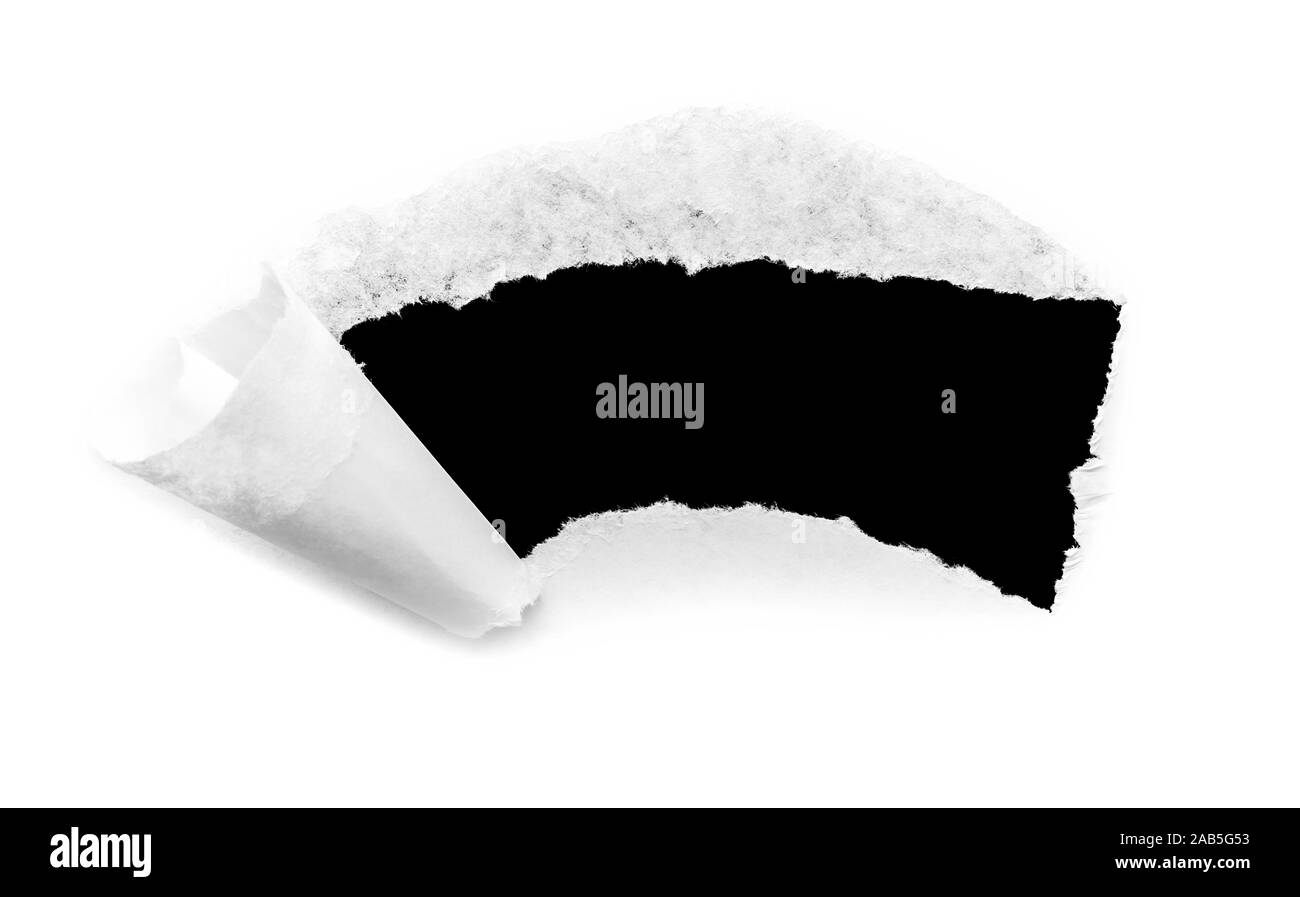 Hole in white paper with torn edges isolated on a white background with ...